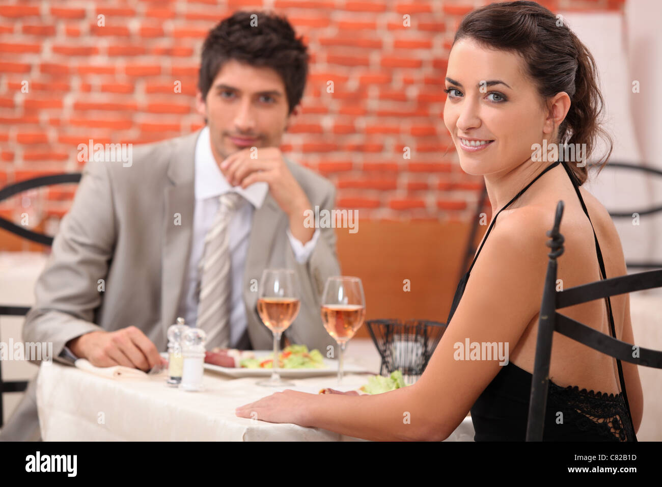 Couple having romantic meal in restaurant Stock Photo - Alamy