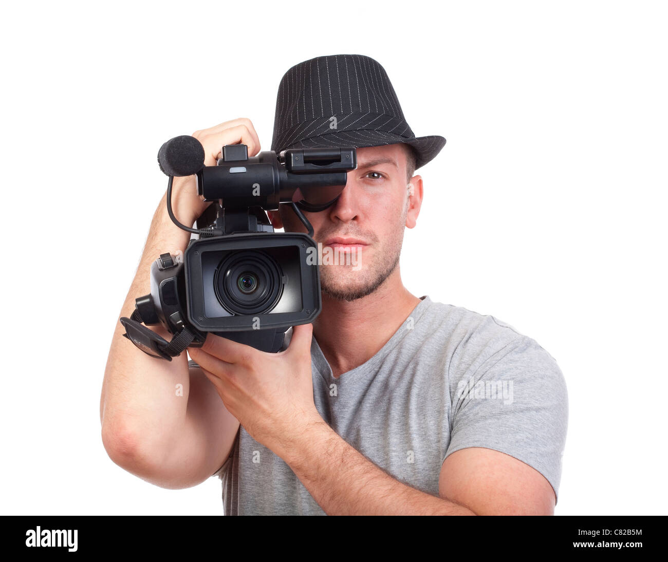 Young professional videographer holding hi-res stock photography and ...