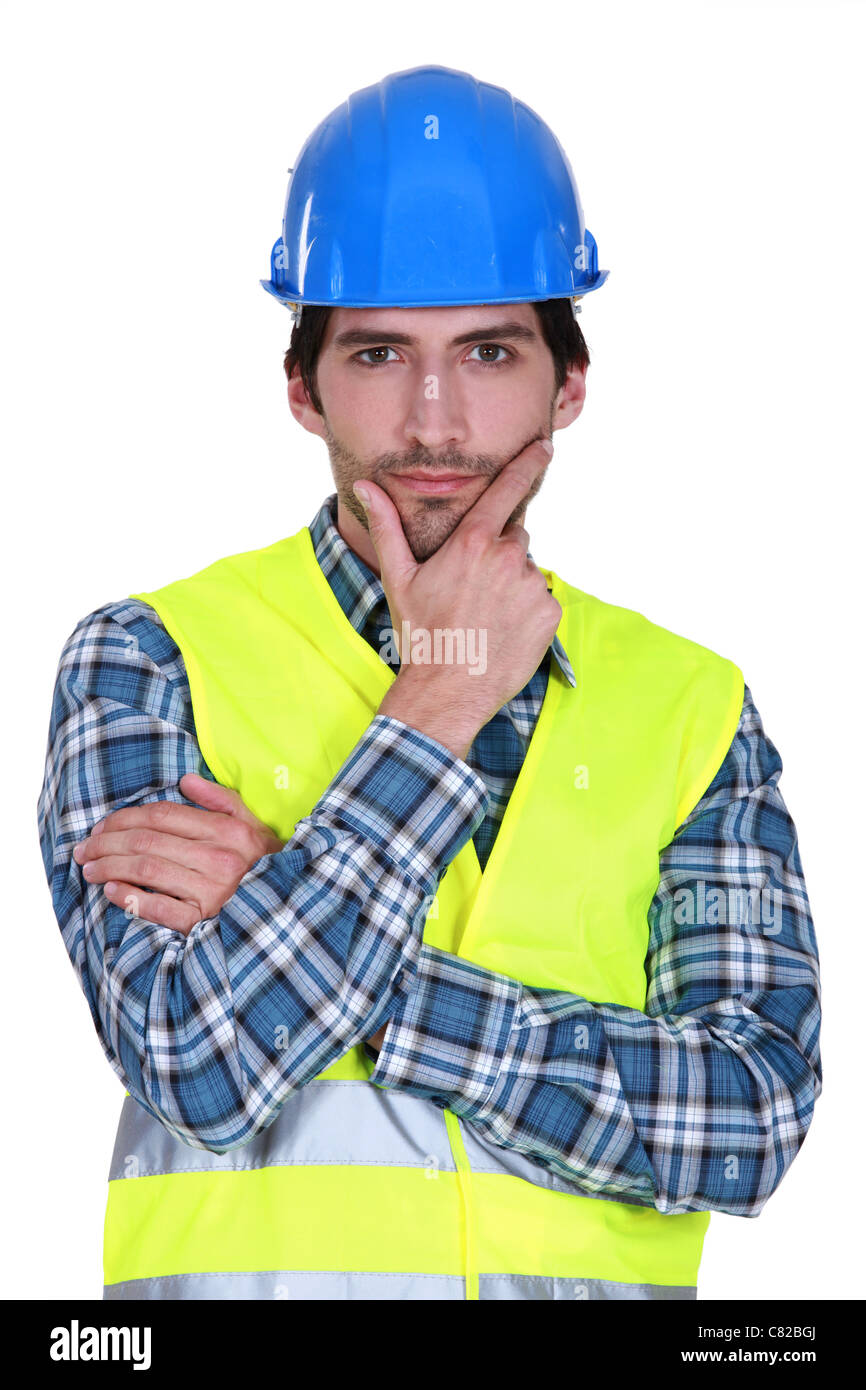 Tradesman staring intently at the camera Stock Photo - Alamy