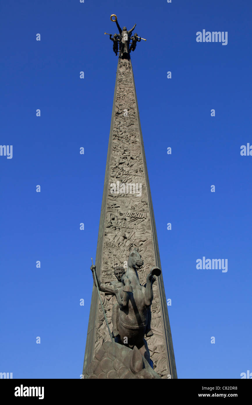 Close-up of the obelisk topped by Nike and a monument of Saint George ...