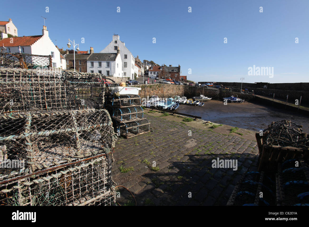 Town of Crail, Scotland. Picturesque view of the fishing harbour at low ...