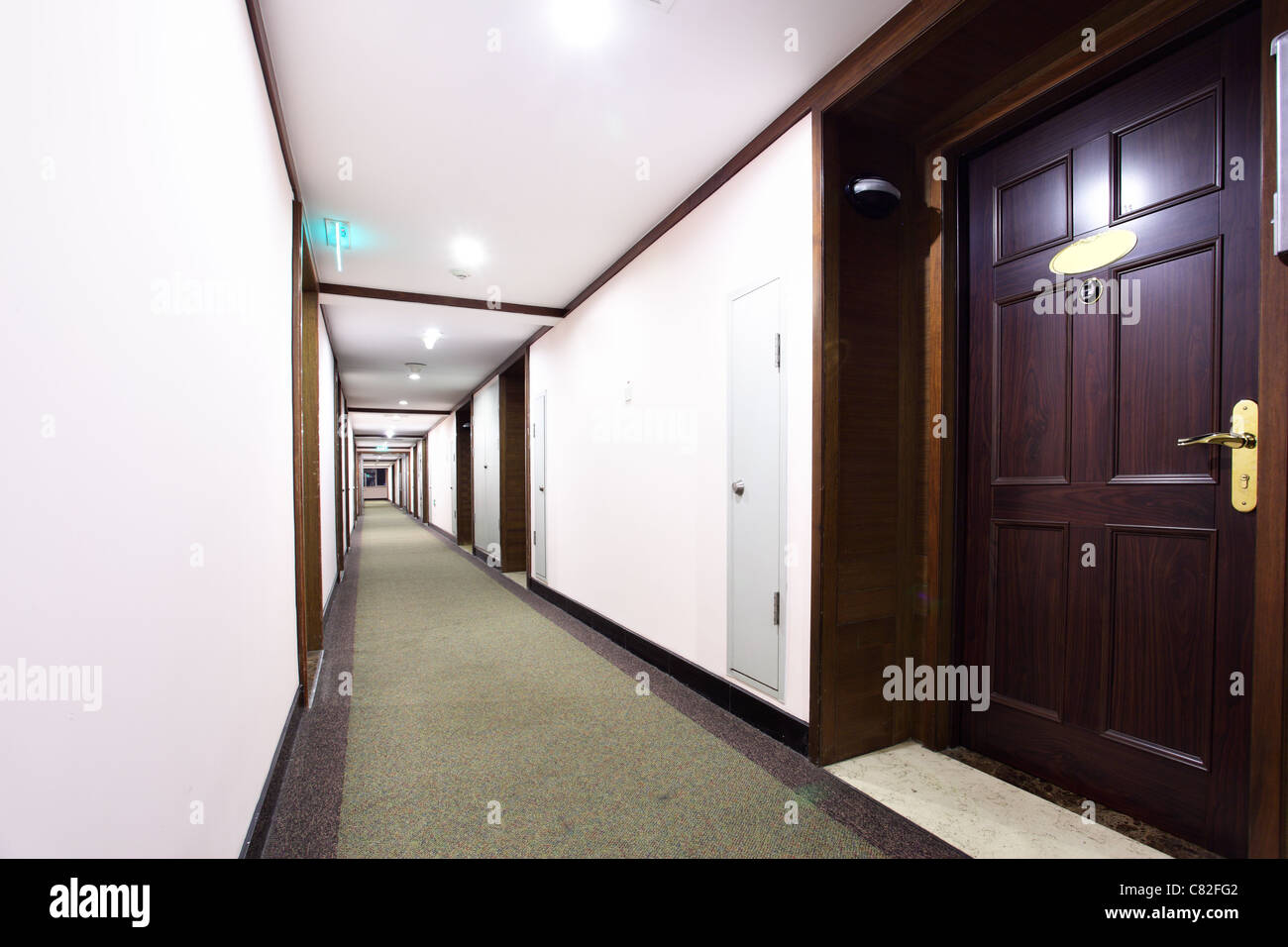 Long hotel corridor hi-res stock photography and images - Alamy
