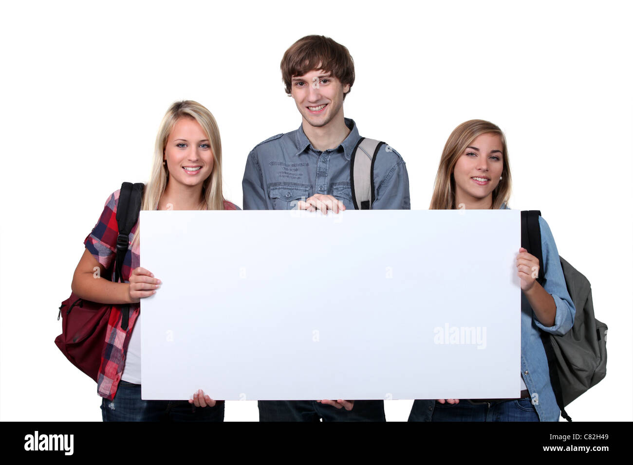 Teenager holding white board Stock Photo - Alamy