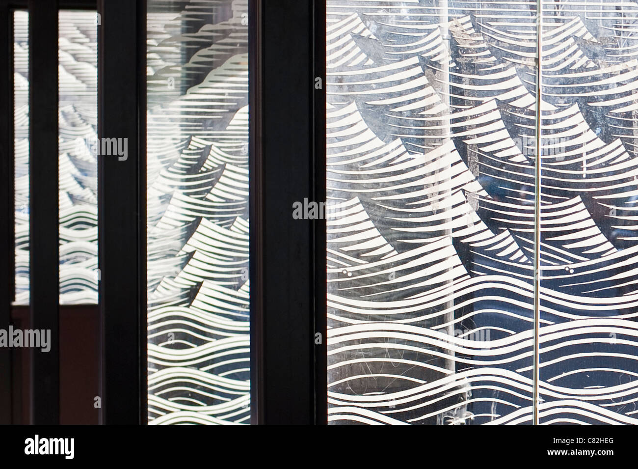 Design patterns waves on a bus stop shelter windows downtown Seattle ...