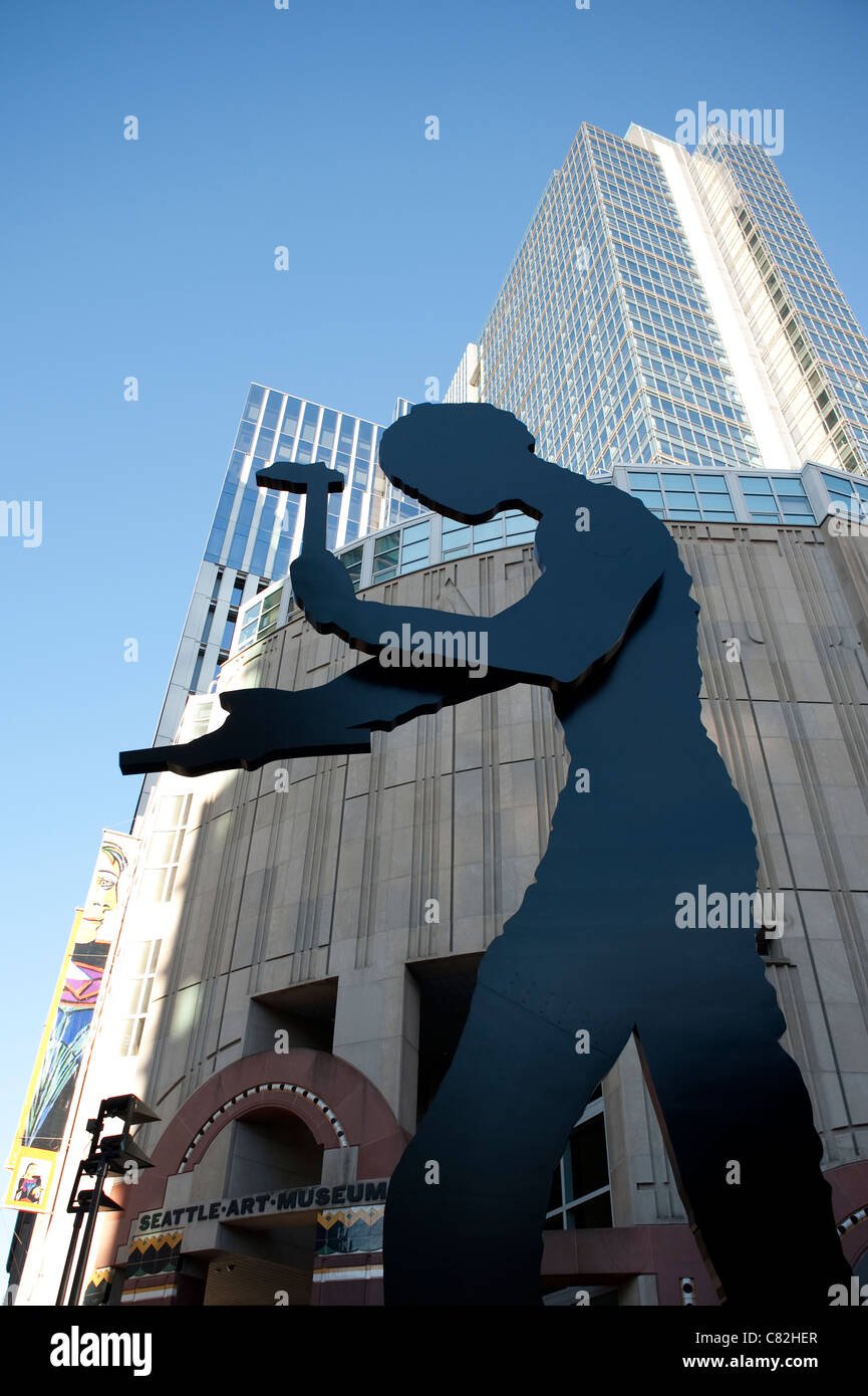 Downtown Seattle street scene with Hammering man in front of the ...