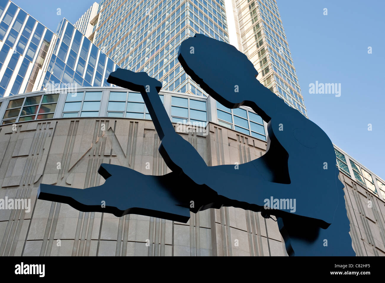 Downtown Seattle street scene with Hammering man in front of the ...