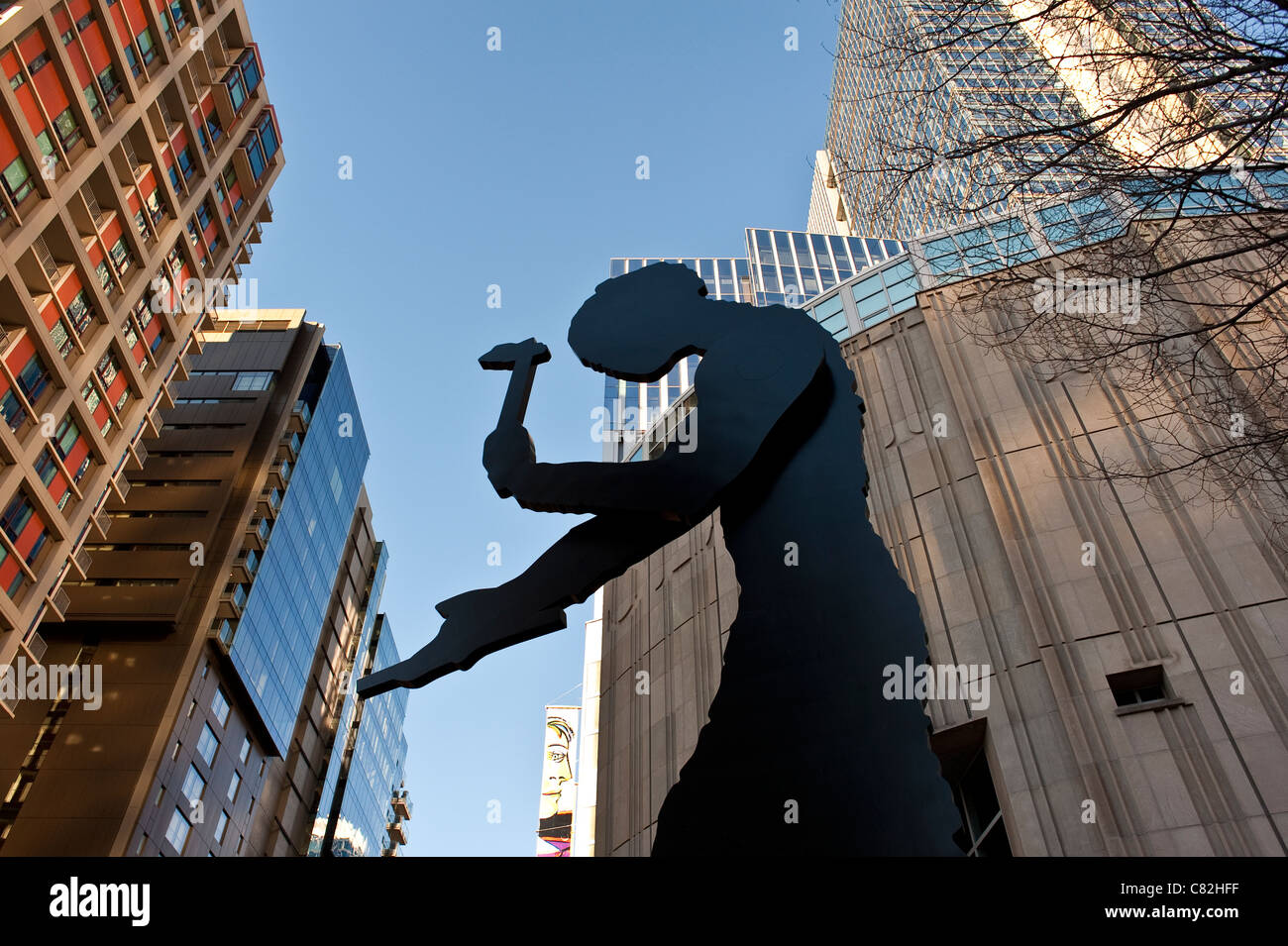 Downtown Seattle street scene with Hammering man in front of the ...