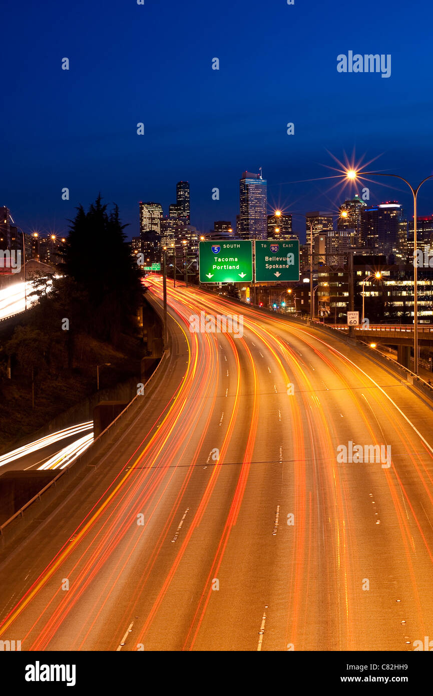 Seattle Downtown skyline with I-5 traffic with car light streaks Stock ...