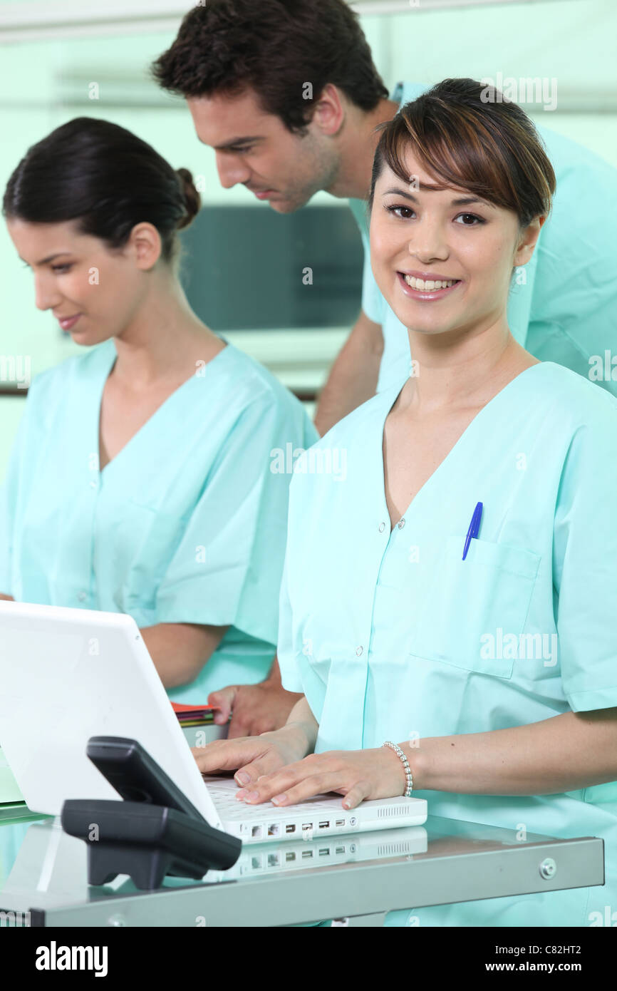 Nurses using a computer Stock Photo - Alamy