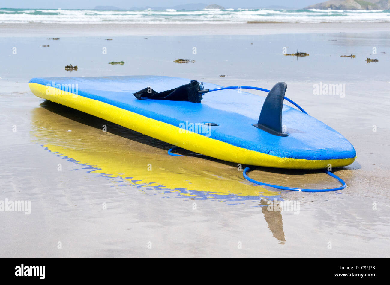 Surfboard on beach Stock Photo - Alamy
