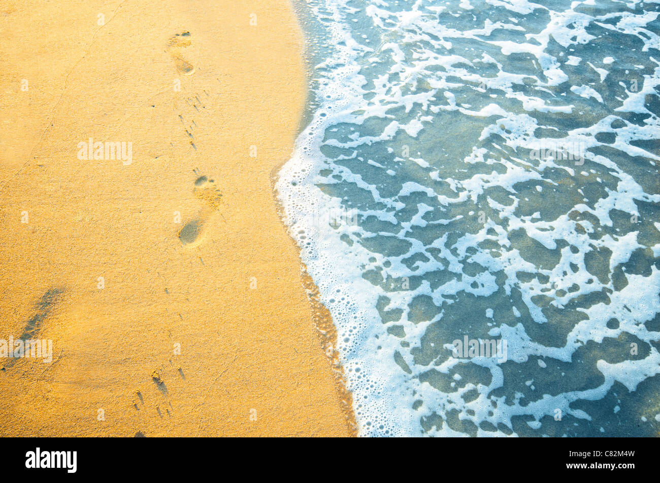 Footprint and wave hi-res stock photography and images - Alamy