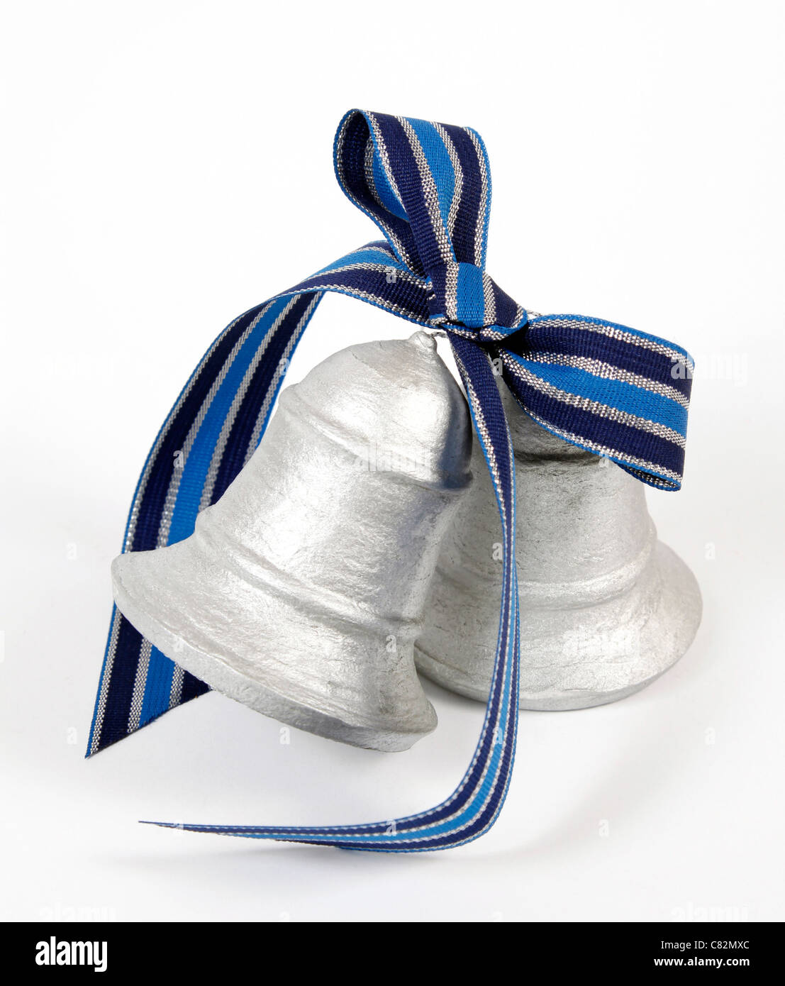 Two silvery bells on the white background Stock Photo - Alamy