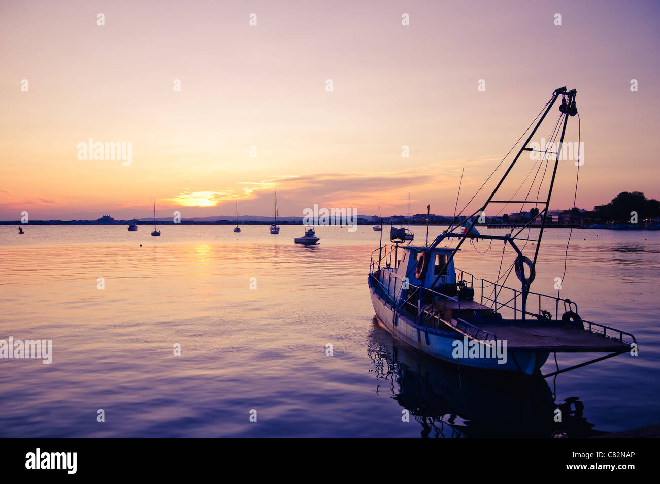 Beautiful sea sunset and ship Stock Photo - Alamy