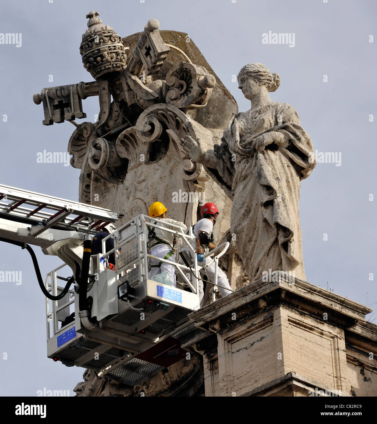 St peters square workmen hi-res stock photography and images - Alamy