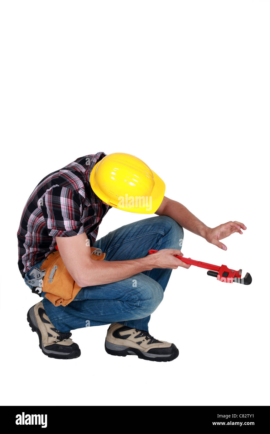 Plumber Working On Invisible Pipe Stock Photo Alamy