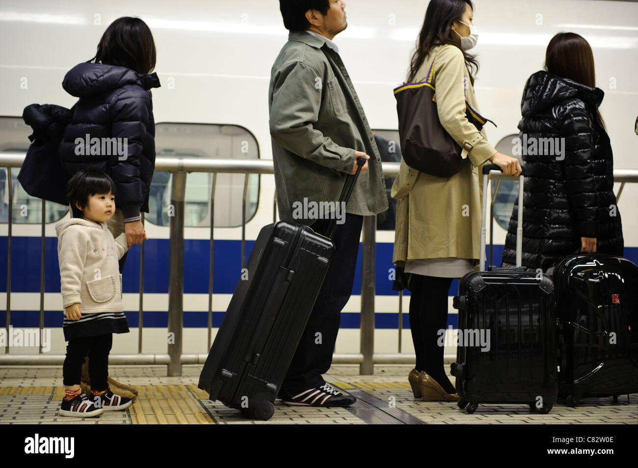 Families taking the bullet train west amidst worries about radiation in ...