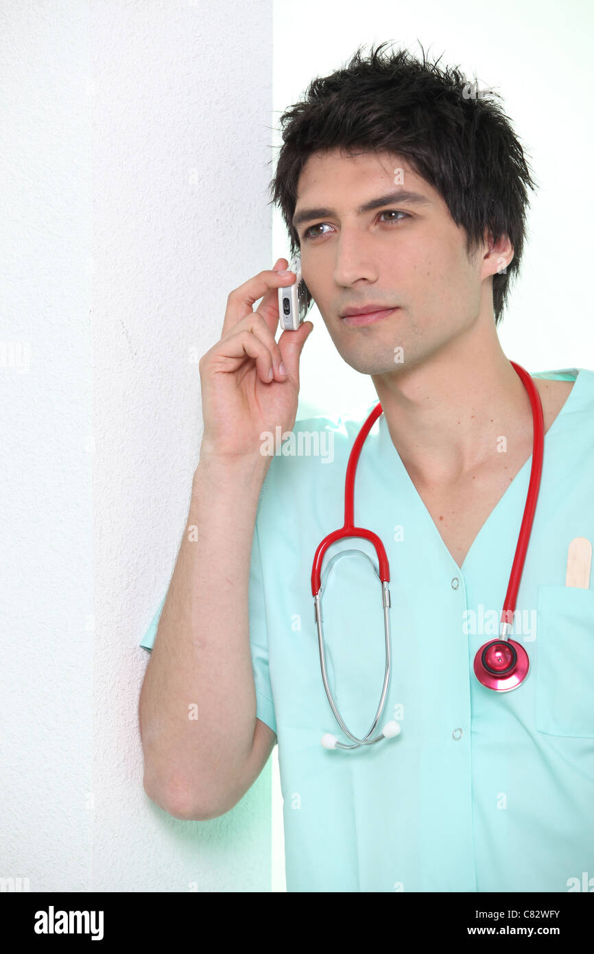 Nurse leaning against wall hi-res stock photography and images - Alamy