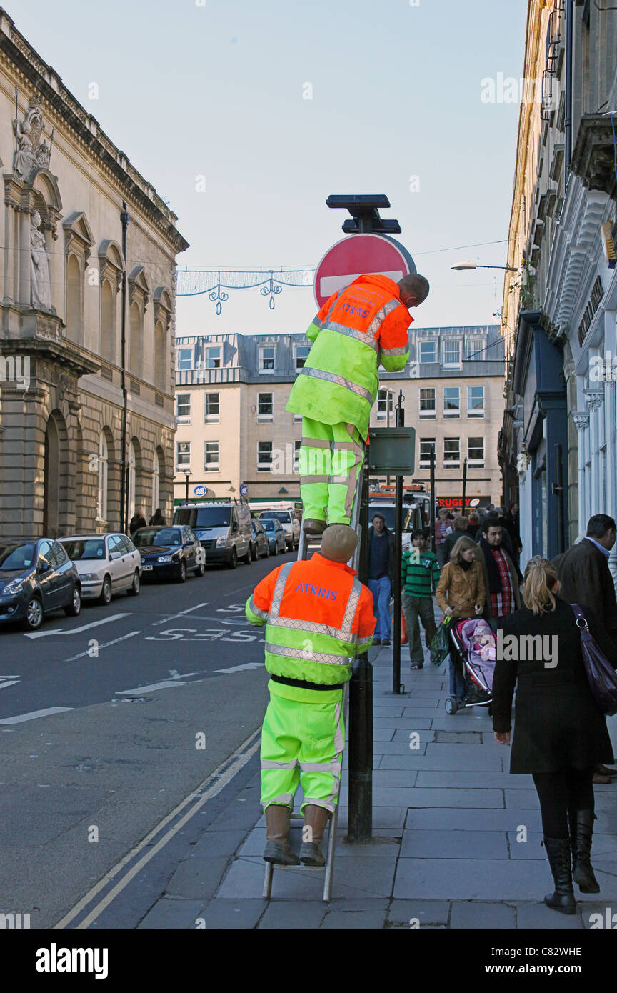 Highway engineers replacing traffic signs in Bridge Street, Bath, N.E ...