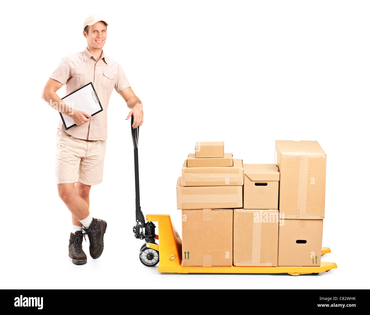Full length portrait of a delivery person holding a clipboard and a ...