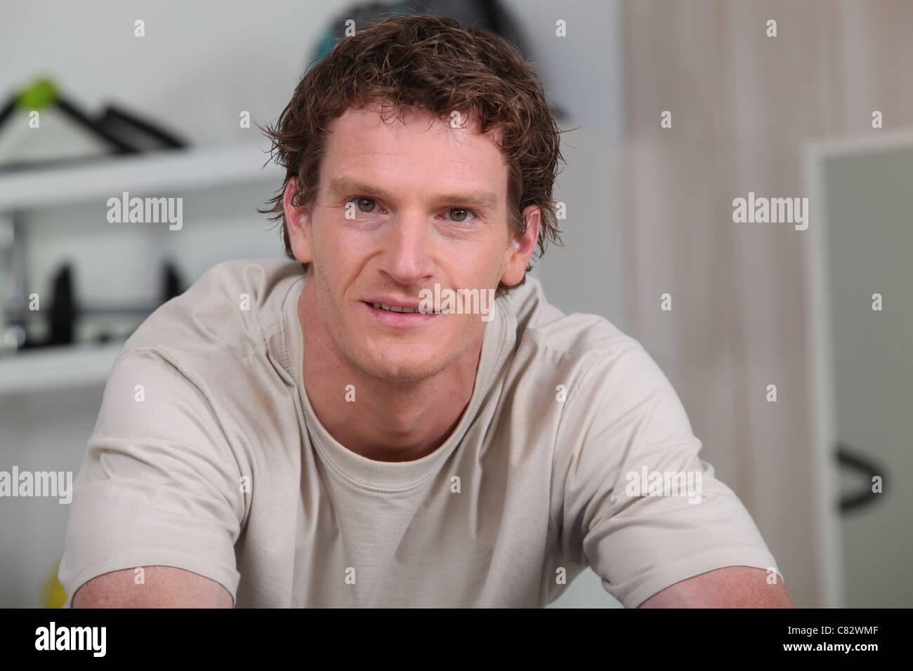 Man sitting at home Stock Photo - Alamy