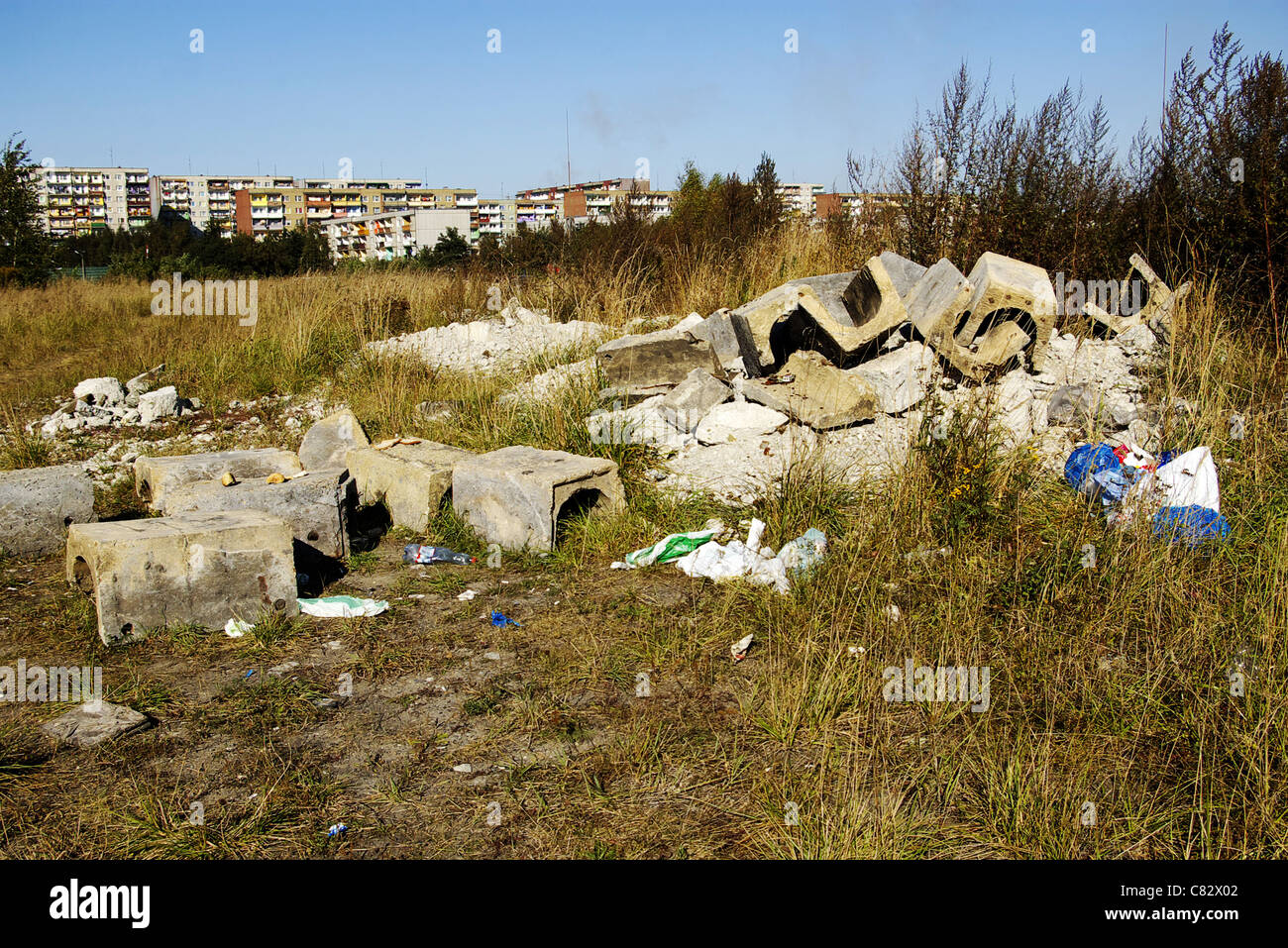 trash on the grass Stock Photo - Alamy