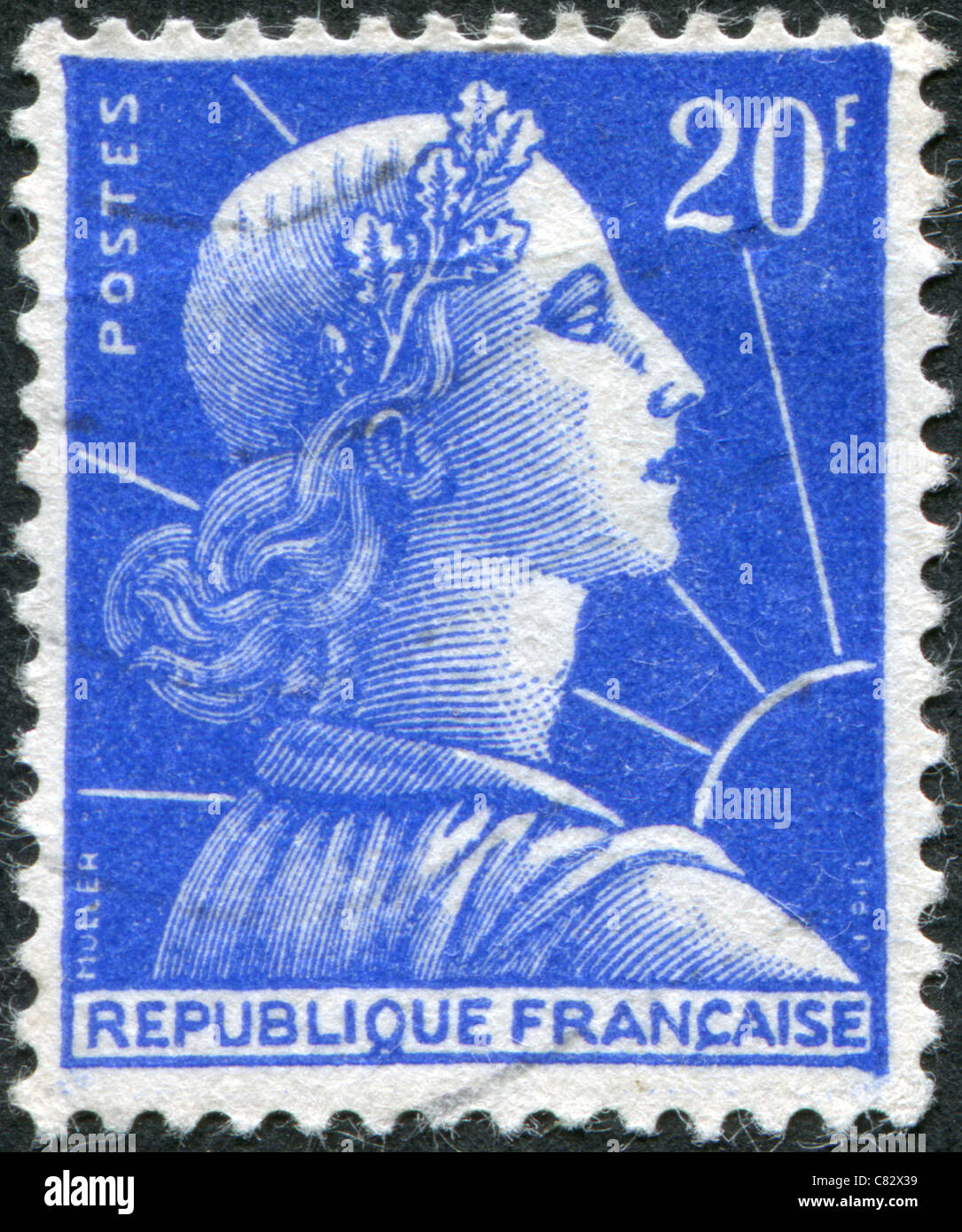 FRANCE - 1957: A stamp printed in France, depicts Marianne is a ...