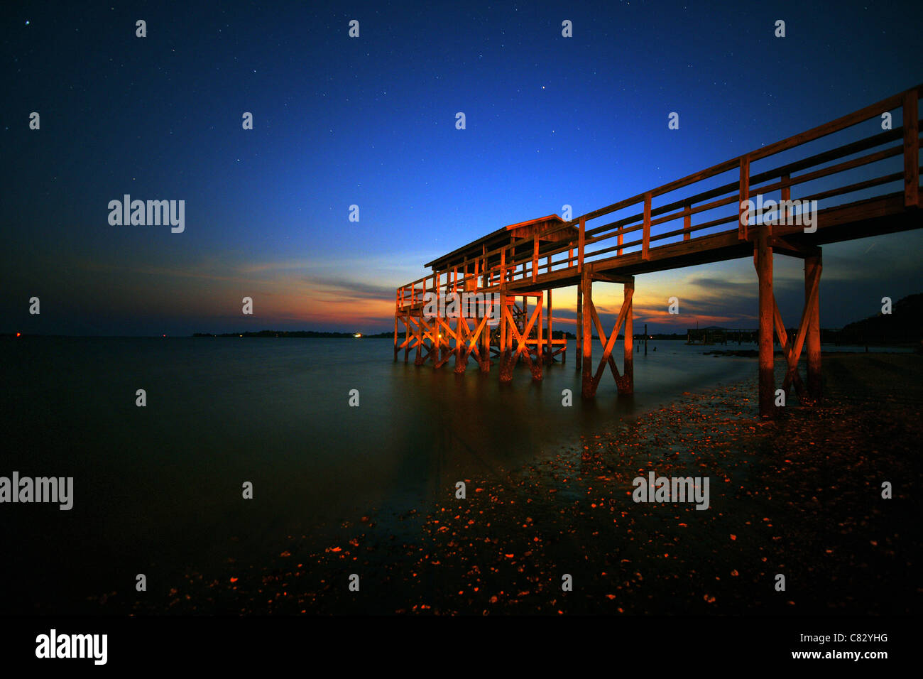 Pier at sunset in Cedar Key, Florida, USA Stock Photo - Alamy