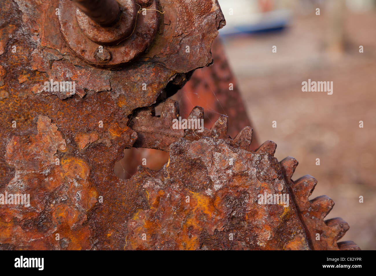 Rusty cogs on an old boat winch Stock Photo - Alamy