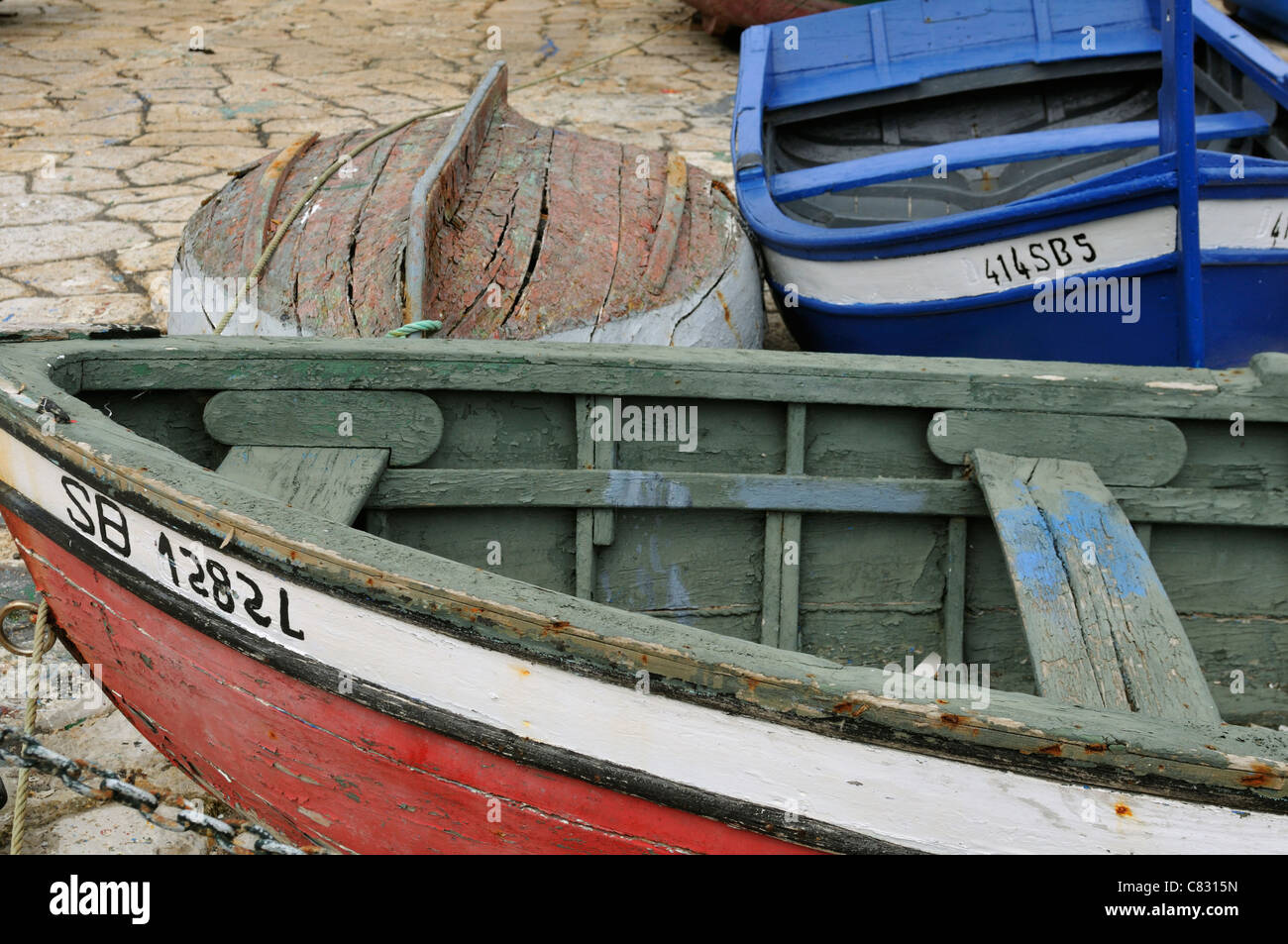 Colourful tree boats in harbour, Sesimbra Stock Photo - Alamy