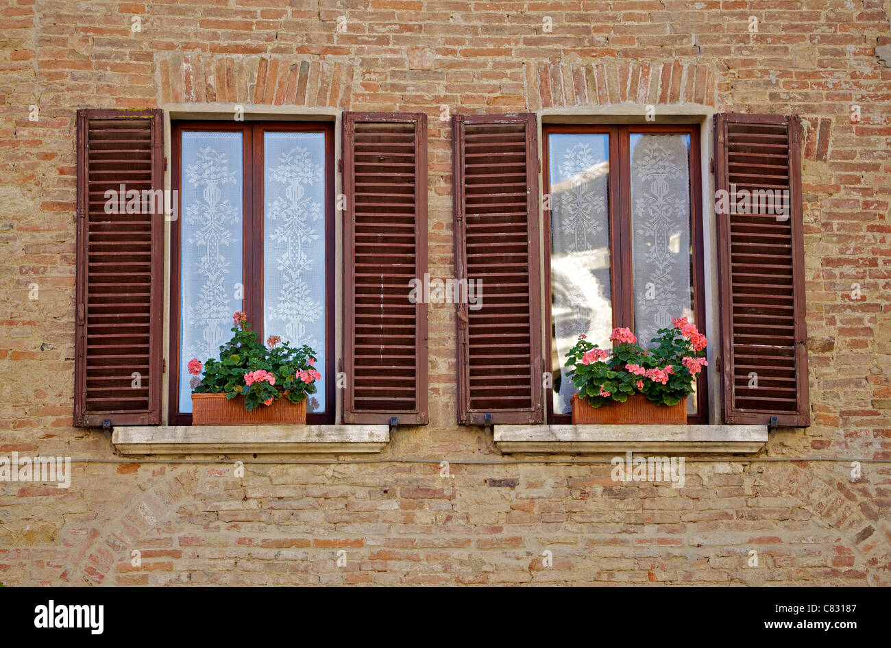 Dueling Windows of Tuscany Stock Photo - Alamy