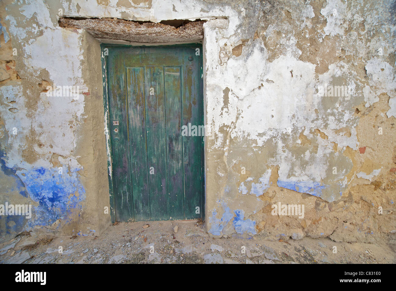 Faded Green Painted Wood Door with a Crumbling Plaster Wall Stock Photo ...