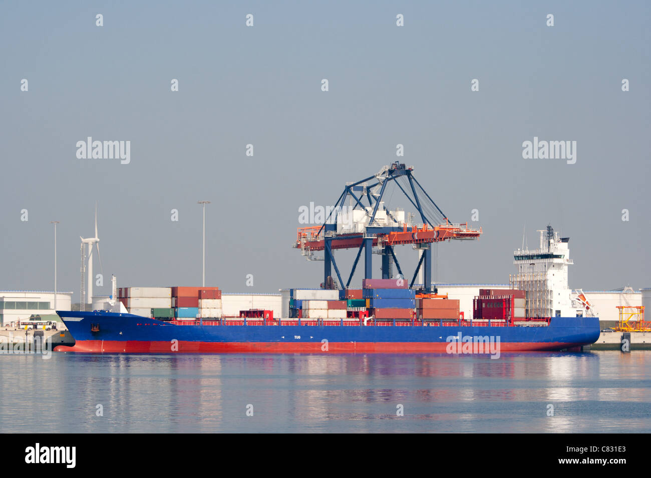 Container ship in a harbor Stock Photo - Alamy