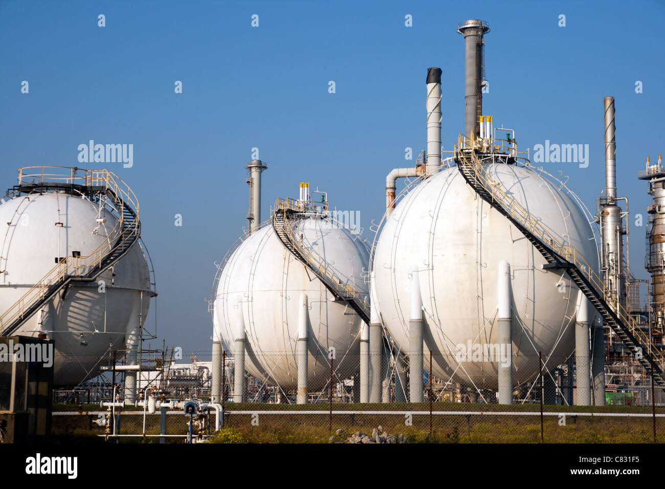 Round oil silos in Rotterdam Europort Stock Photo - Alamy