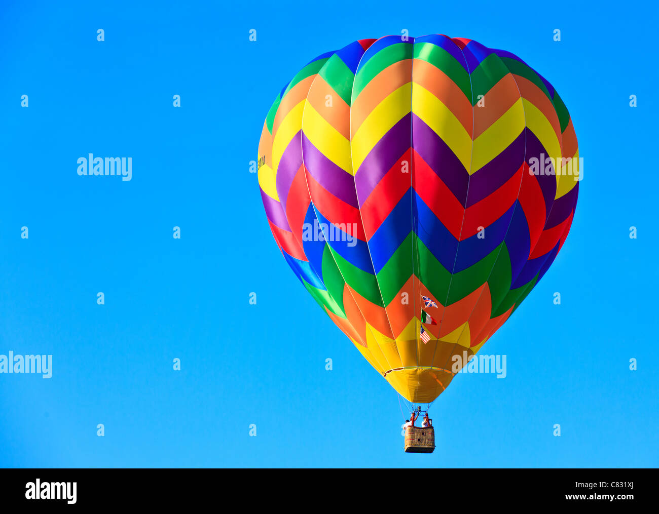 Hot air balloon drifting on a calm sunny afternoon, Ferrara, Italy ...