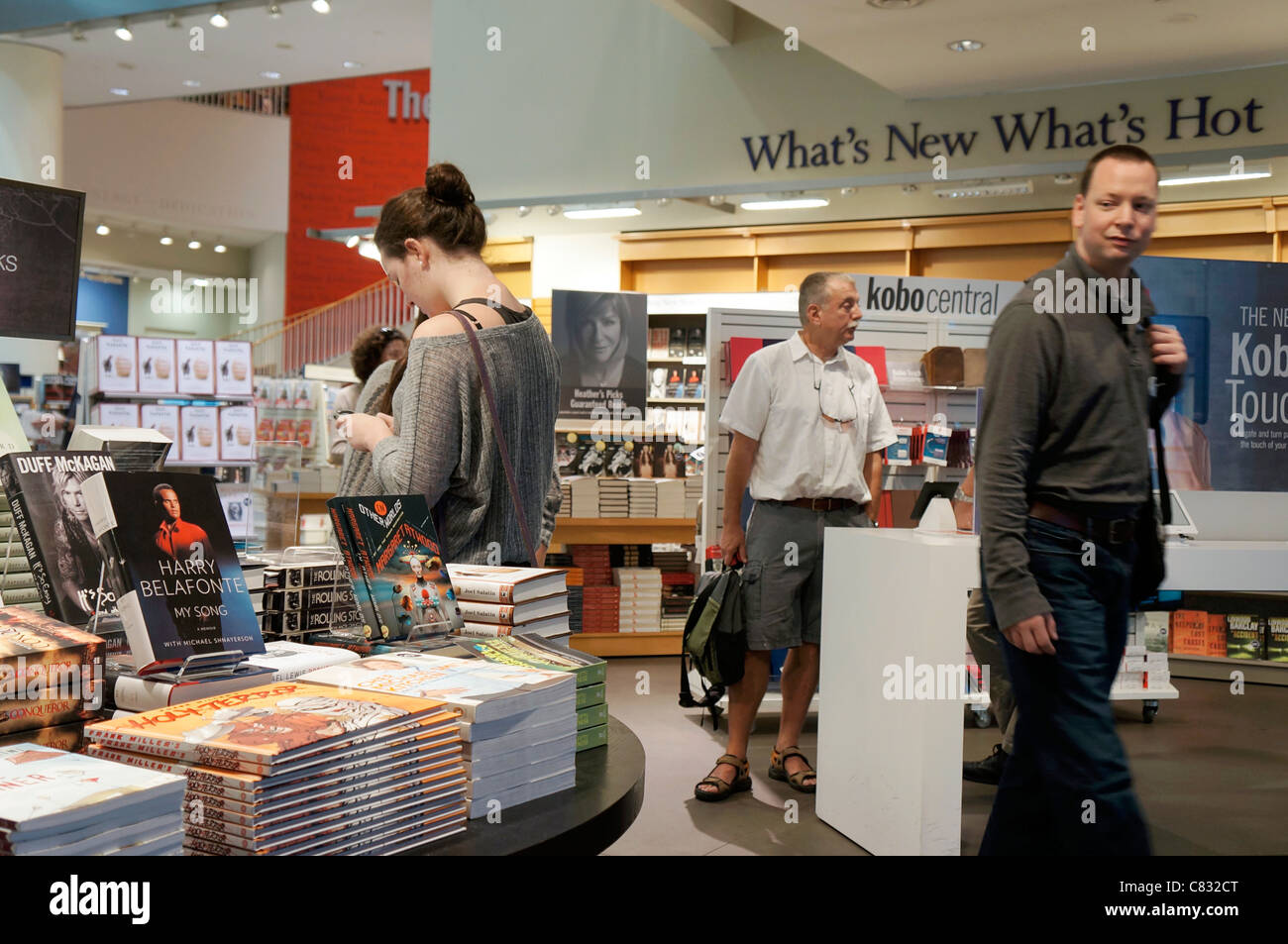 People browsing and shopping in a Bookstore, Indigo Stock Photo - Alamy
