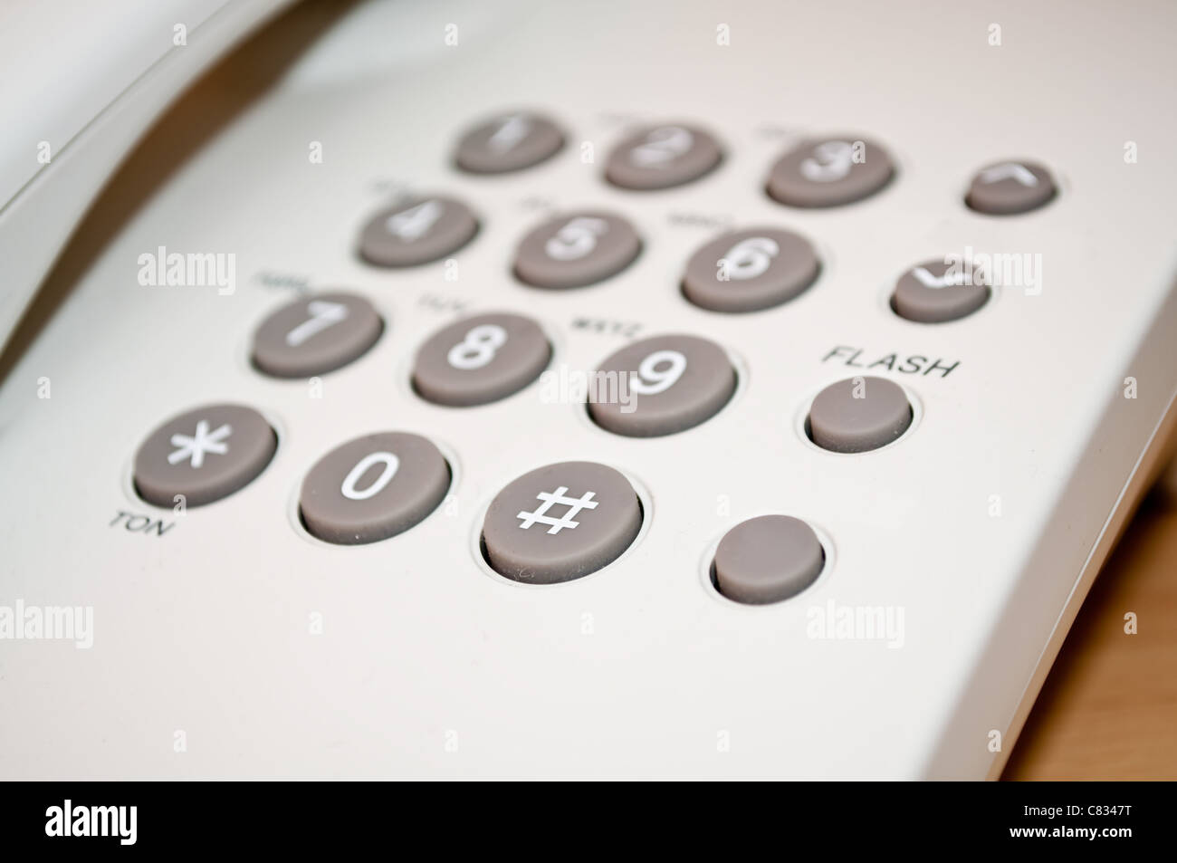 white telephone on desk Stock Photo - Alamy