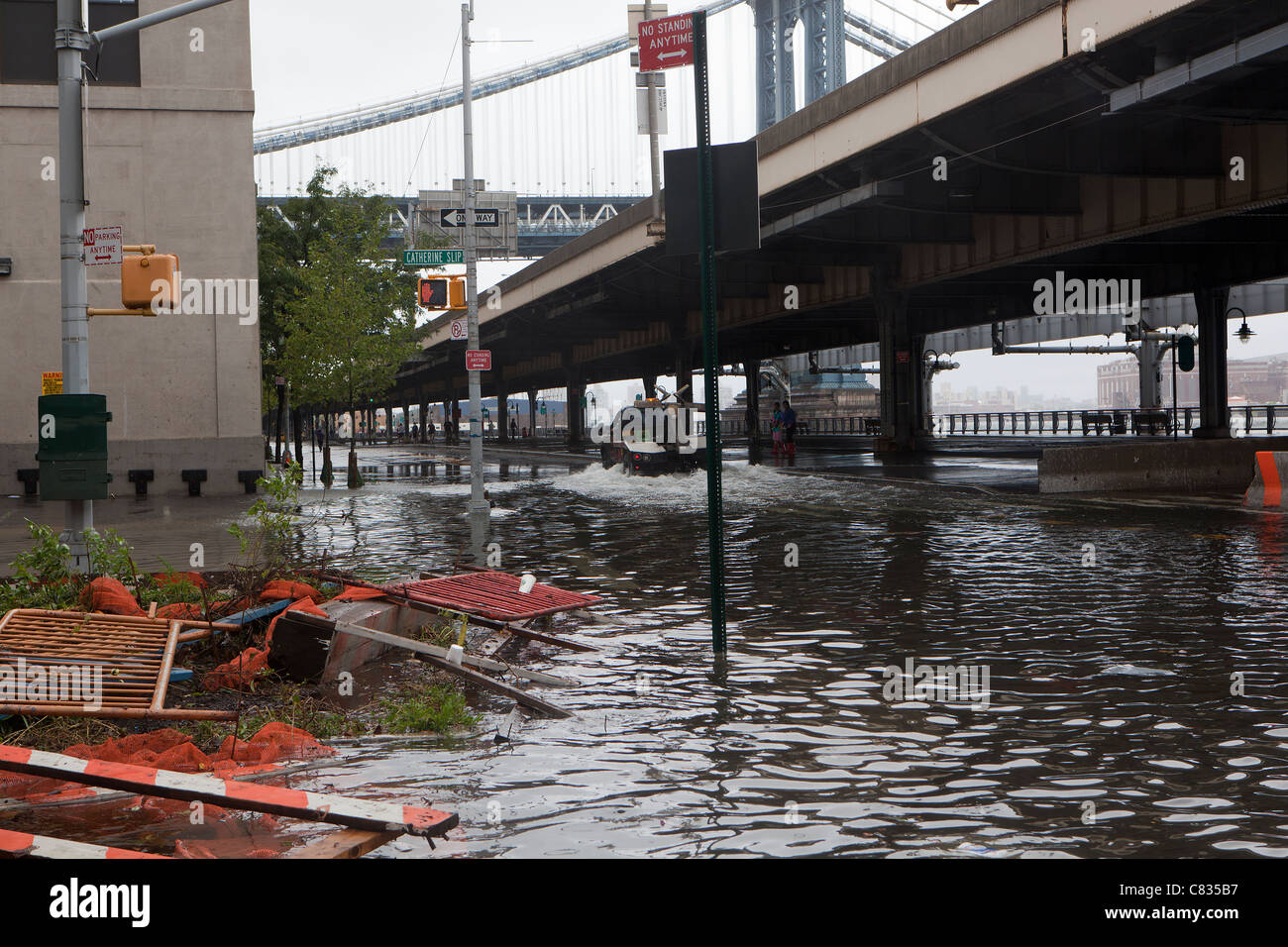 Flooded street under Manhattan Bridge in NYC, during Hurricane Irene ...