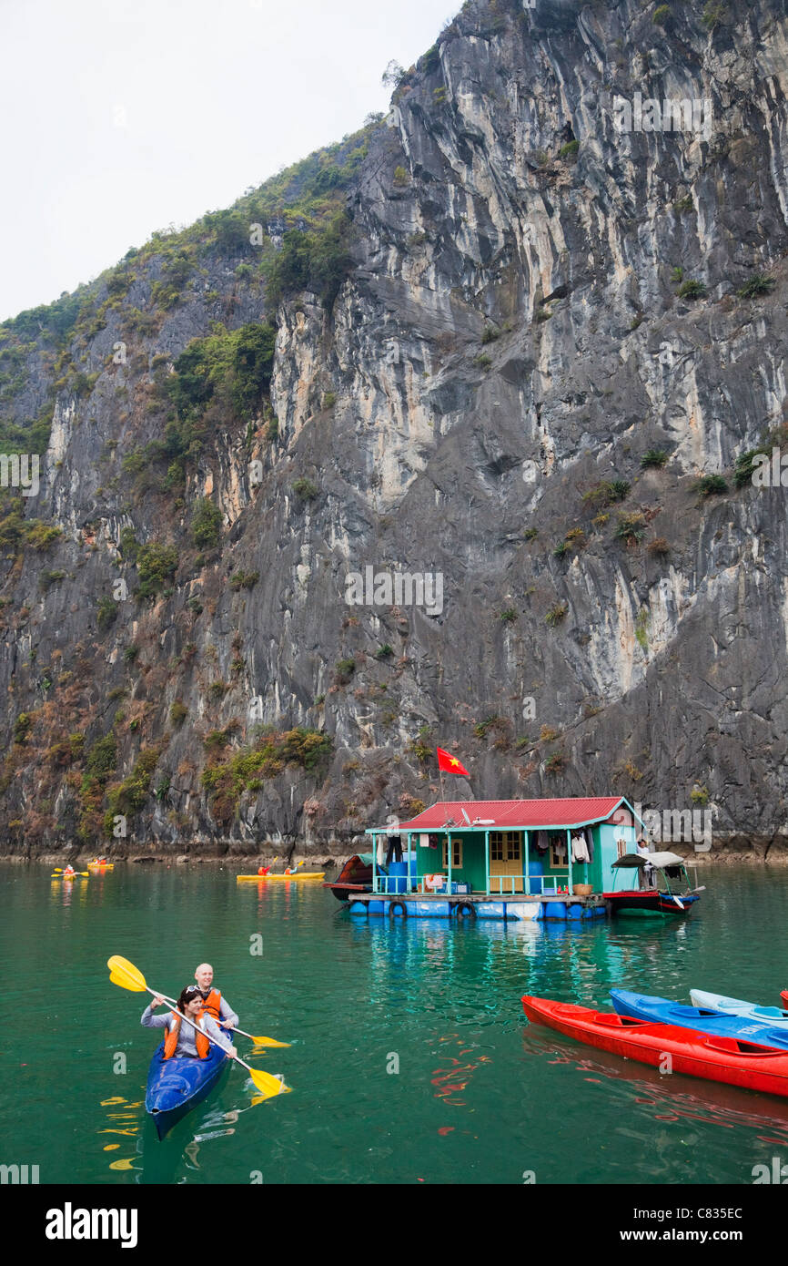 Vietnam, Halong Bay, Tourists Kayaking Stock Photo - Alamy