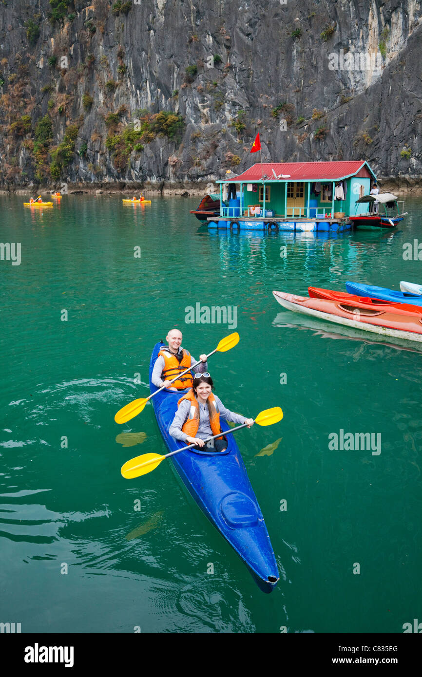 Vietnam, Halong Bay, Tourists Kayaking Stock Photo - Alamy