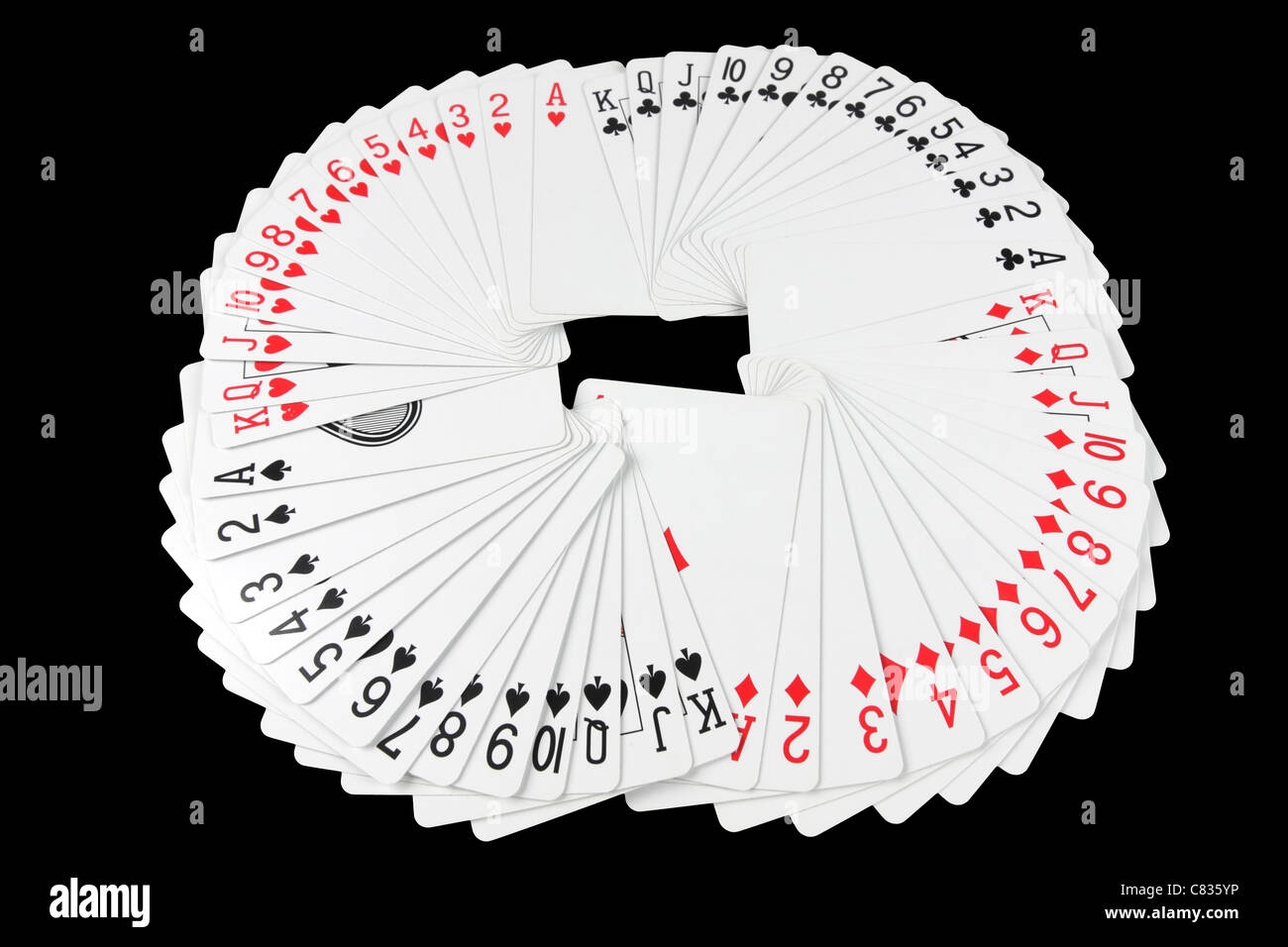 Playing cards fanned in a wheel showing all the suits Stock Photo - Alamy