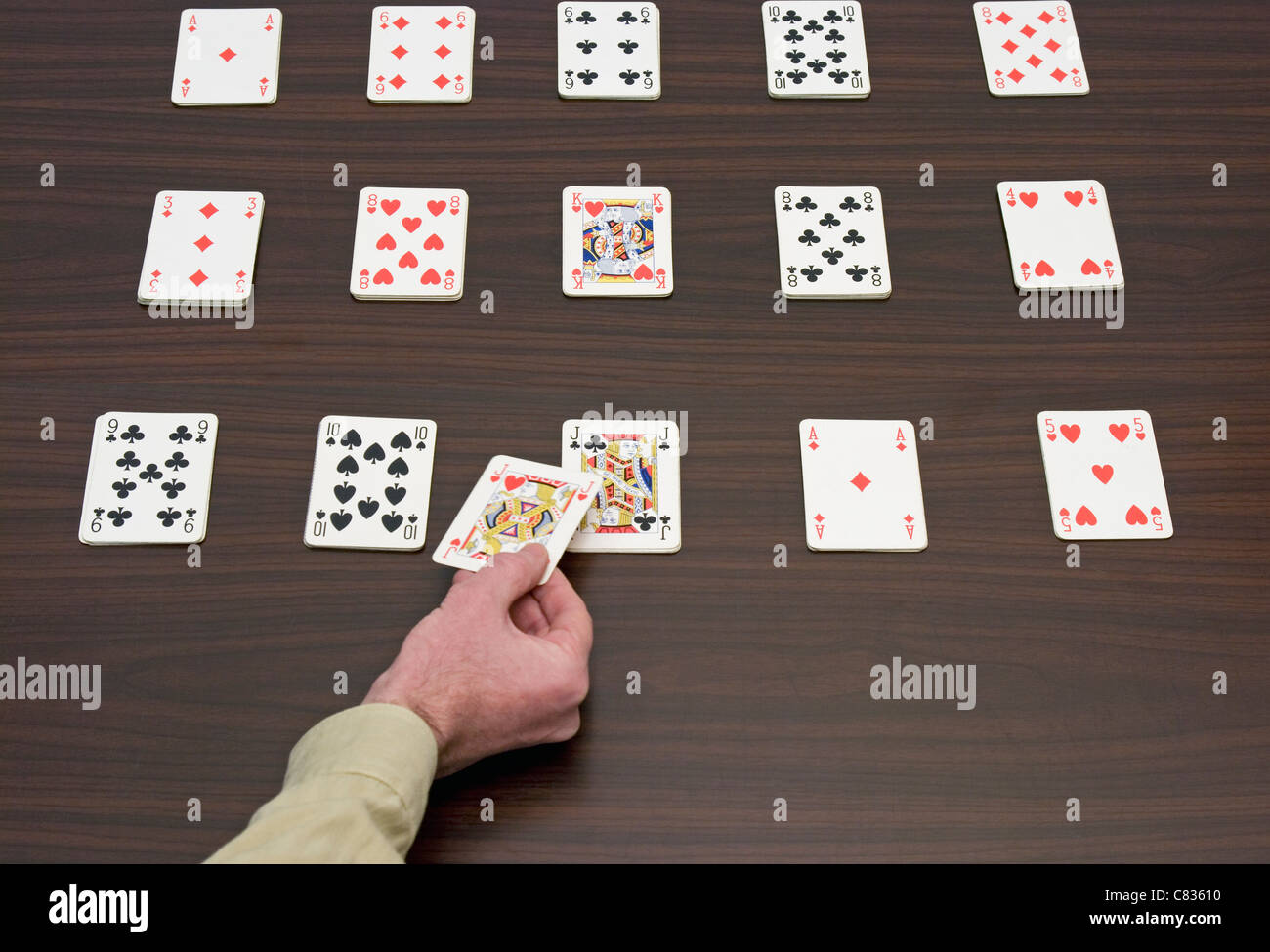 Arranging cards hi-res stock photography and images - Alamy