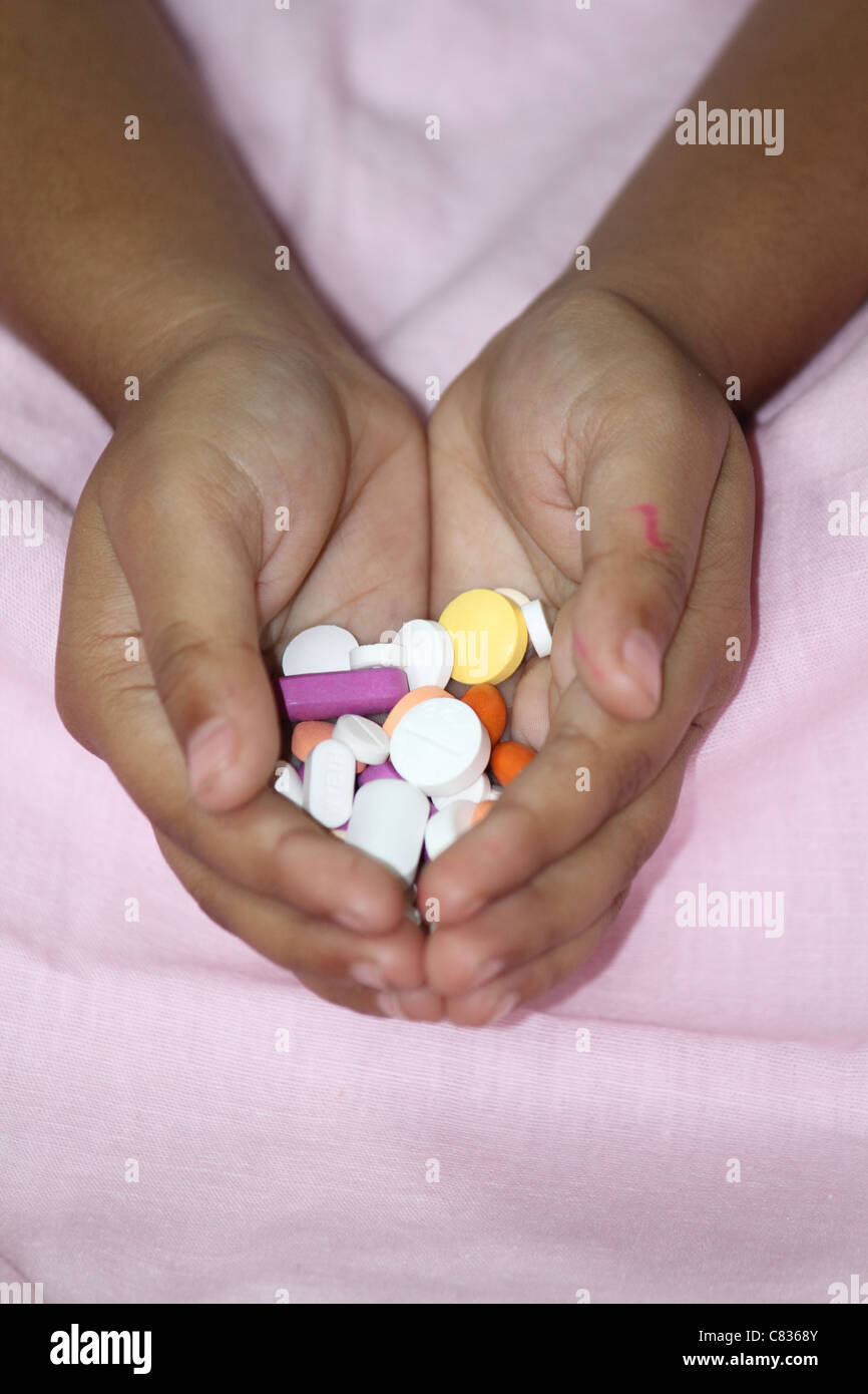 Stack of Tablets in Human Hand Stock Photo - Alamy