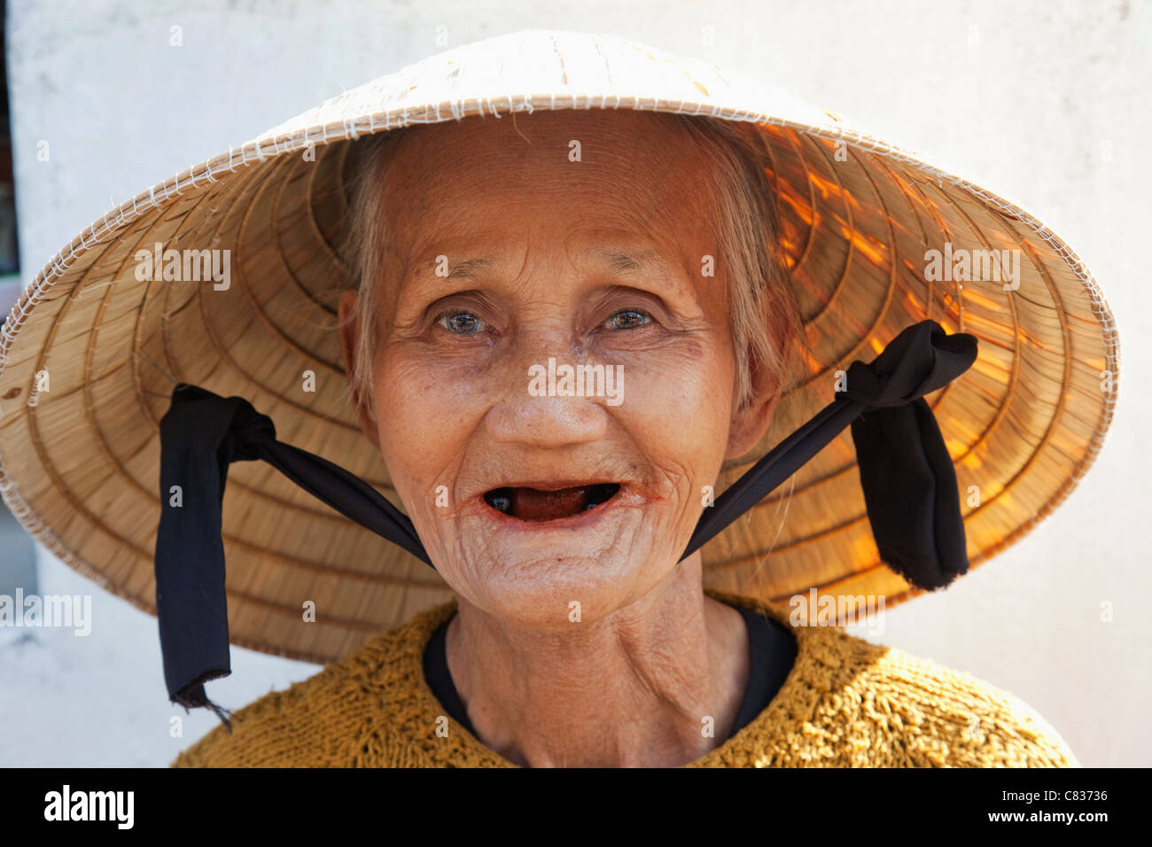 Asian lady wearing conical hat hi-res stock photography and images - Alamy