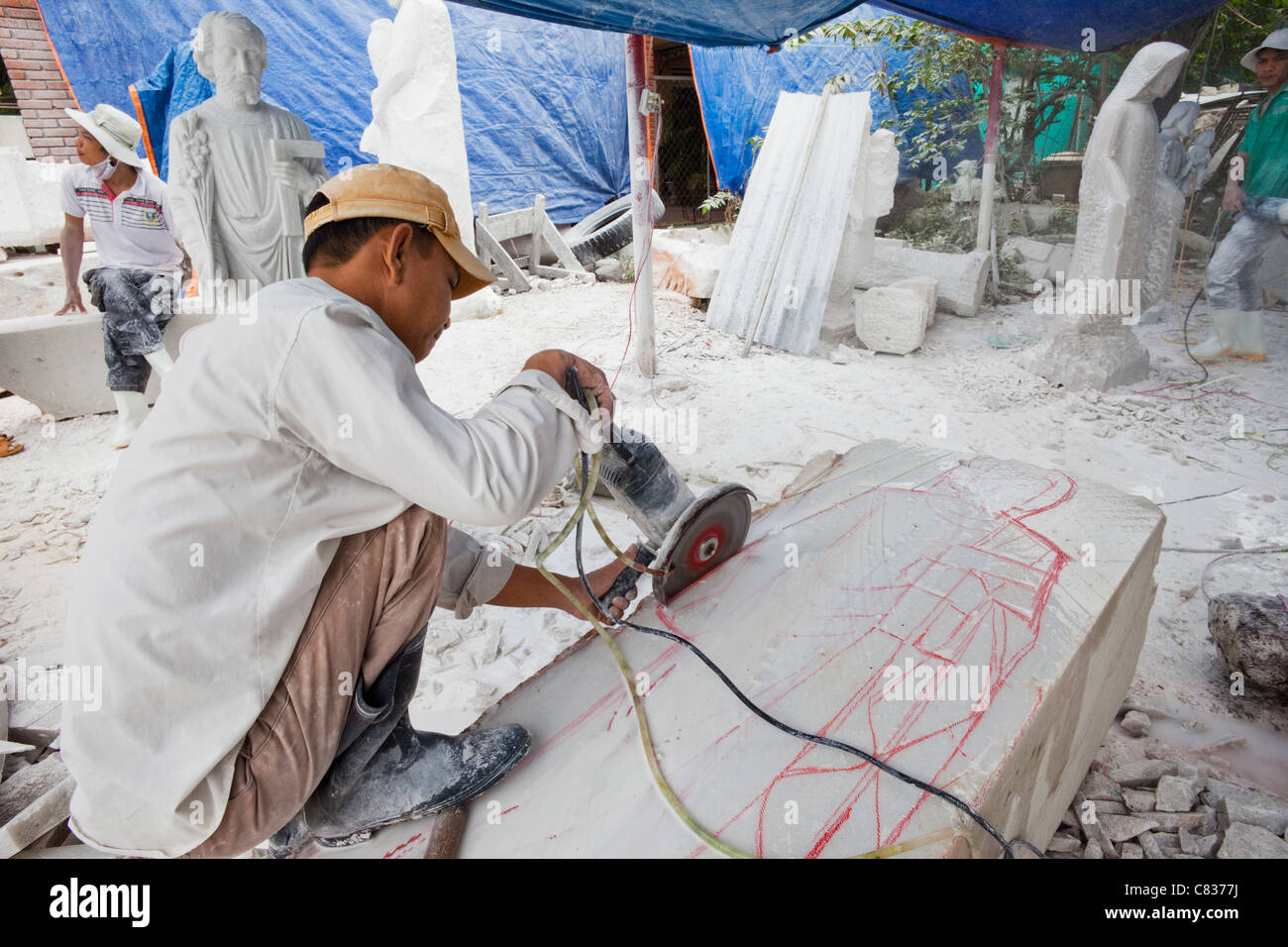Vietnam, Hoi An, Marble Mountain, Danang, Worker Cutting Marble Block ...
