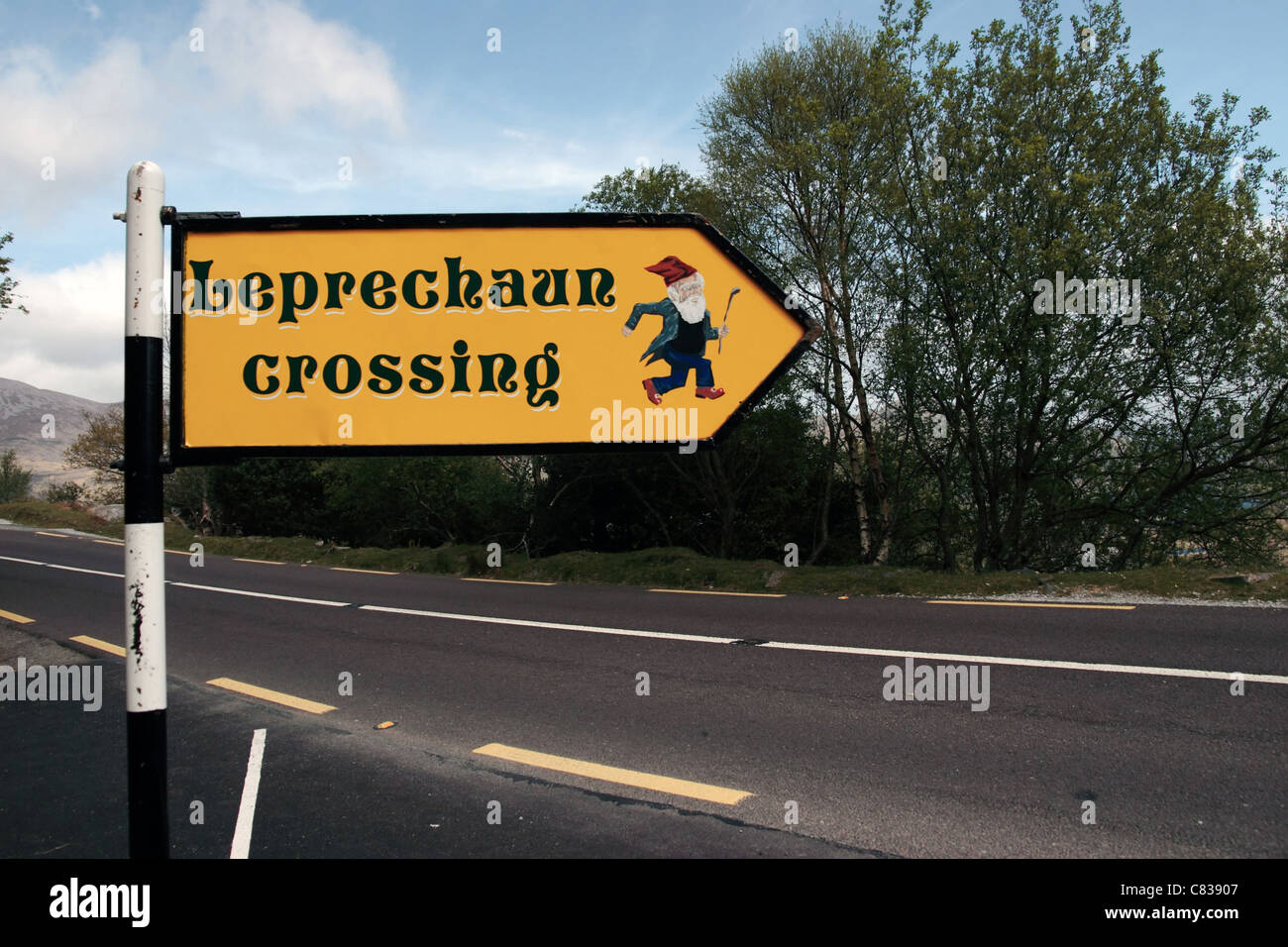 a view of a leprechaun crossing sign post in county kerry ireland Stock ...