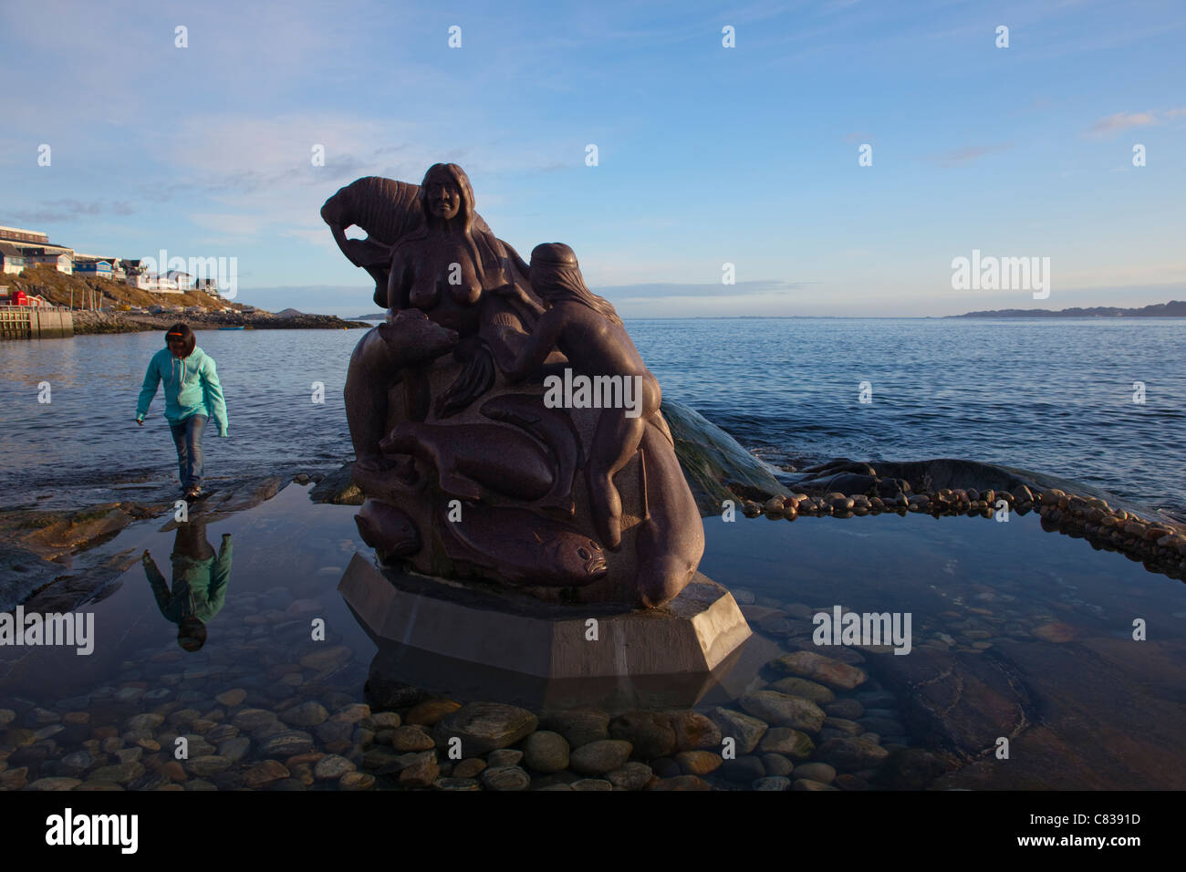 A statue at the old harbour in Nuuk, Greenland of Arnakuagsak , or ...