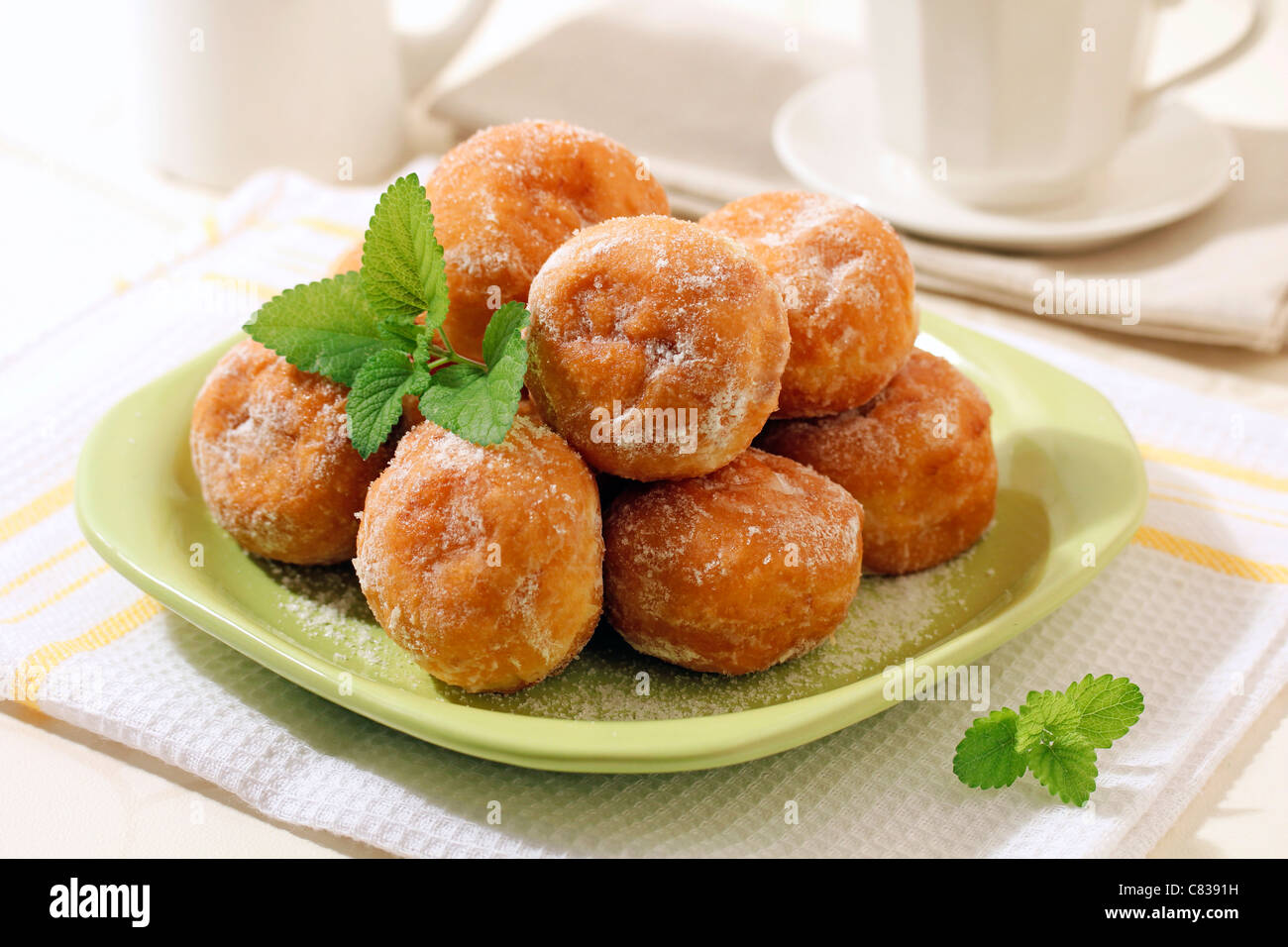 Custard cream fritters. Recipe available Stock Photo - Alamy