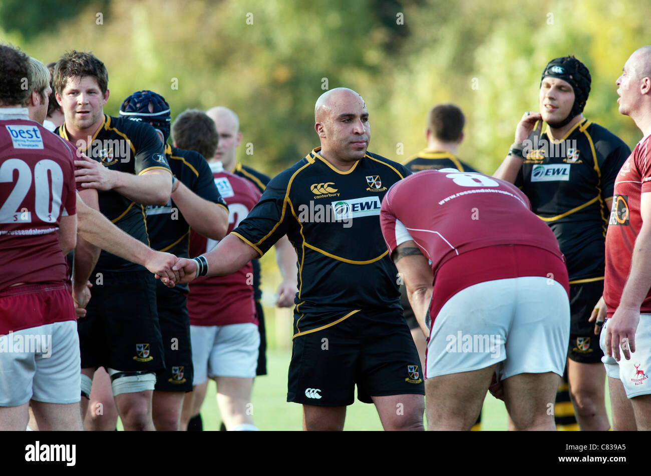 Burnage rugby shakes hand with Rossendale players after losing a close ...