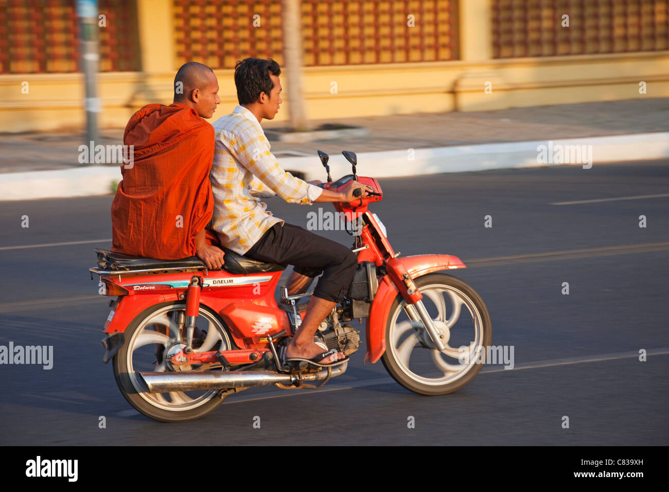 Cambodia, Phnom Penh, Monk on Motorcycle Stock Photo - Alamy