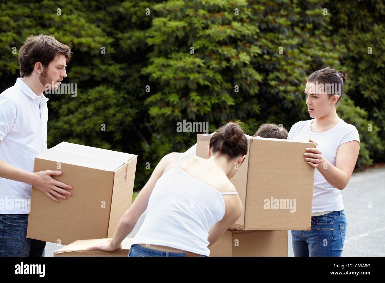 People stacking cardboard boxes Stock Photo - Alamy